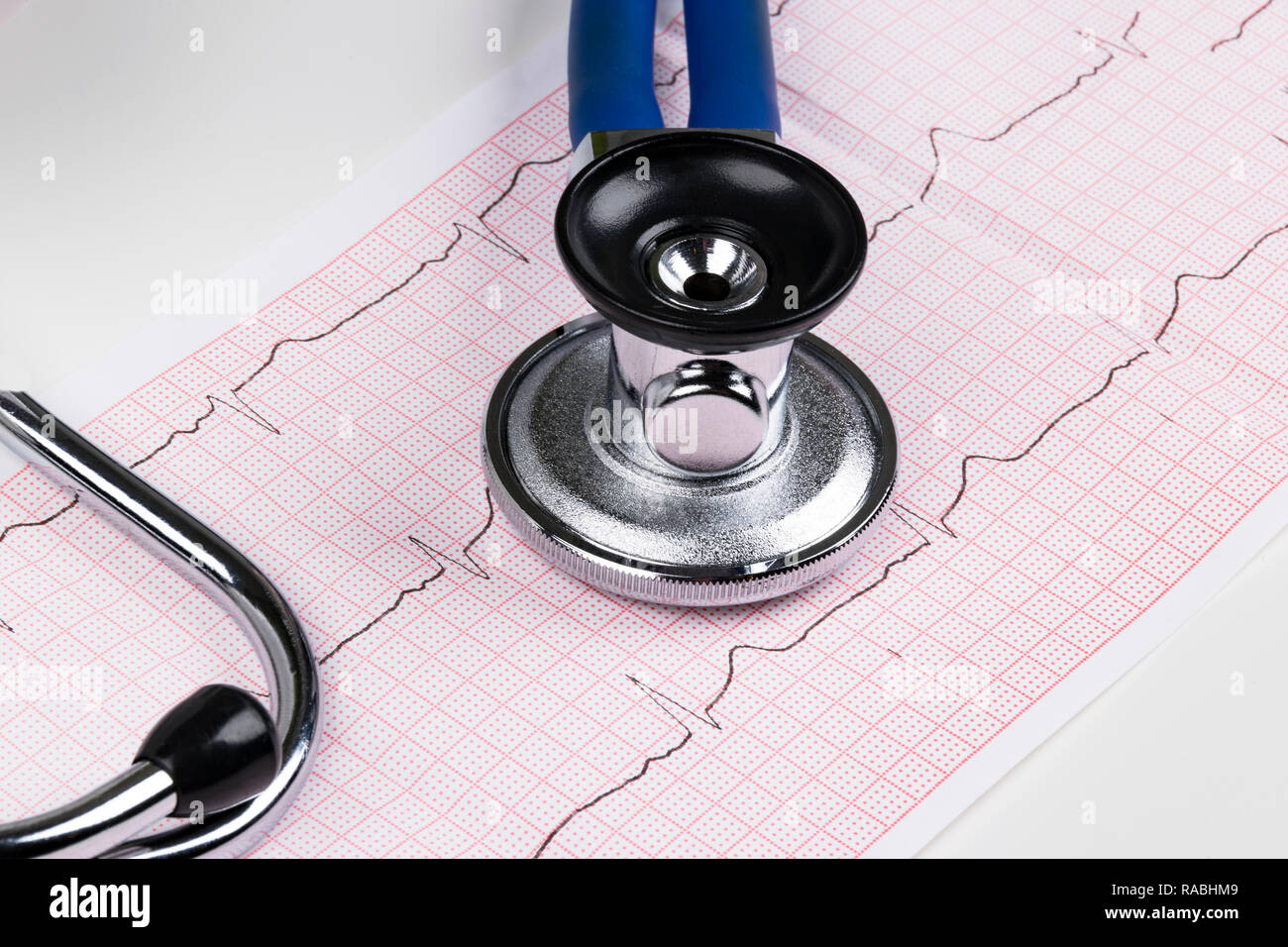 Stethoscope on the electrocardiogram (ECG) graph.Medicine concept ...