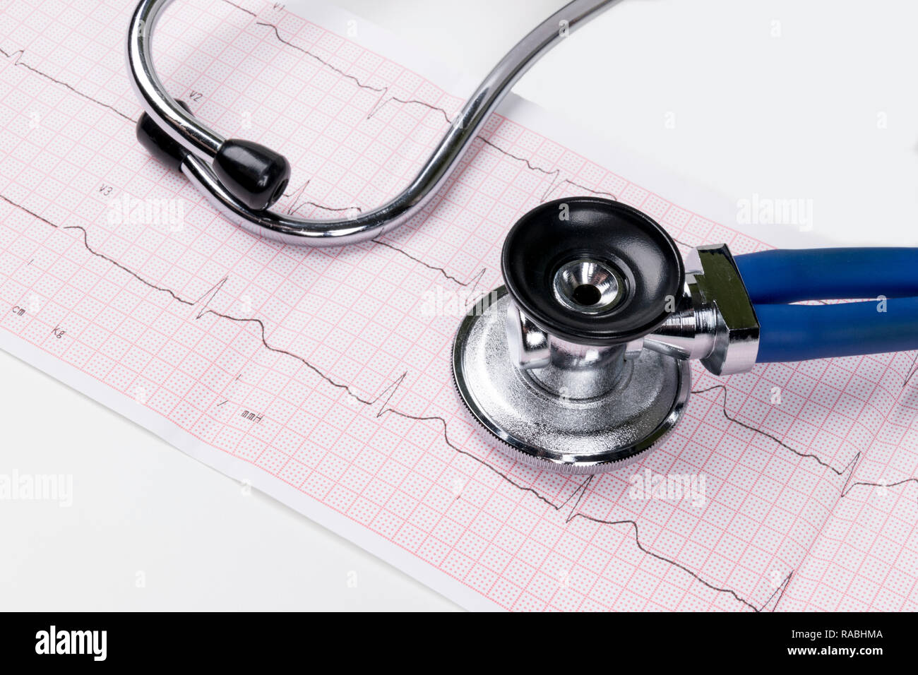 Stethoscope on the electrocardiogram (ECG) graph.Medicine concept ...