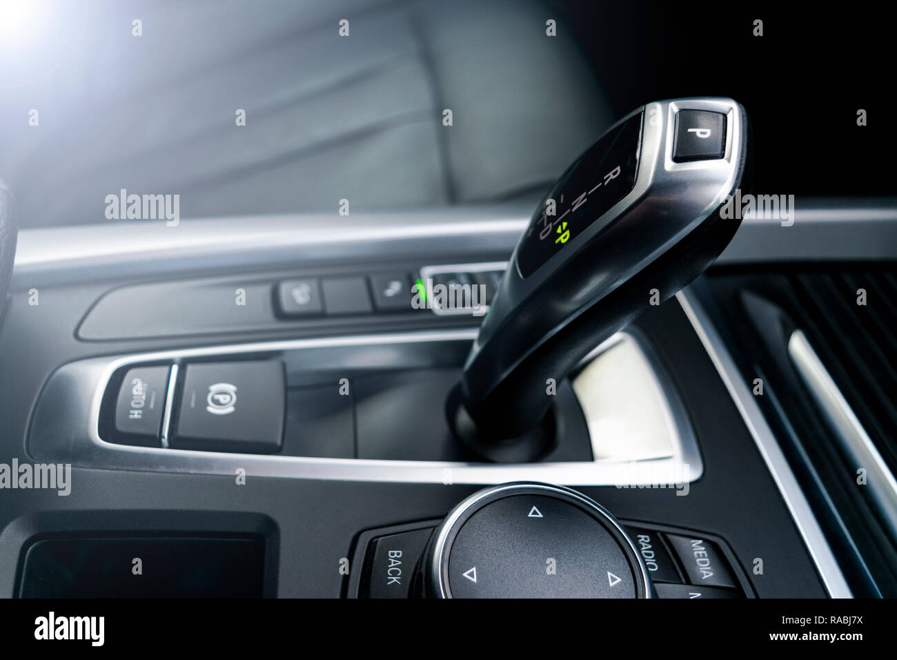 Automatic gear stick (transmission) of a modern car, multimedia and ...