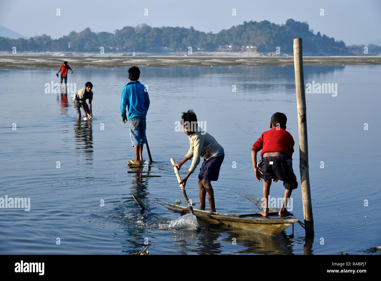 Indian boys play in river hi-res stock photography and images - Alamy