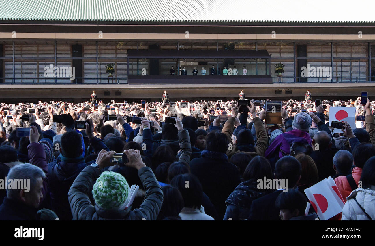 Well-wishers gather to celebrate a new year greeting at the East Plaza ...