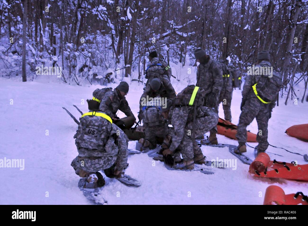 Soldiers from the 10th Mountain Division prepare litters during a ...