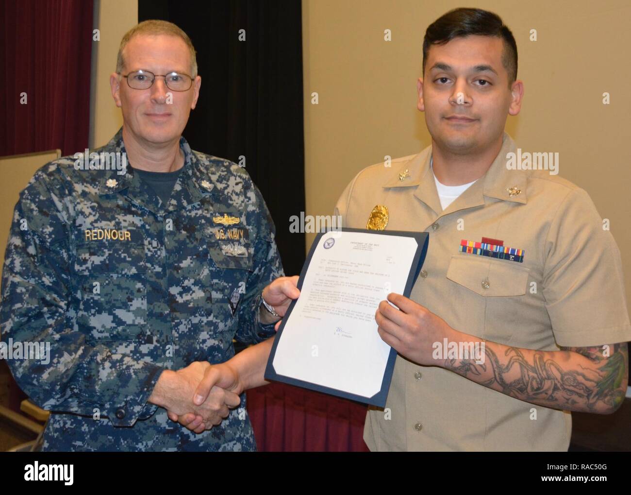 BREMERTON, Wash. (Jan. 11, 2017) – Cdr. Brian Rednour (left), Naval ...