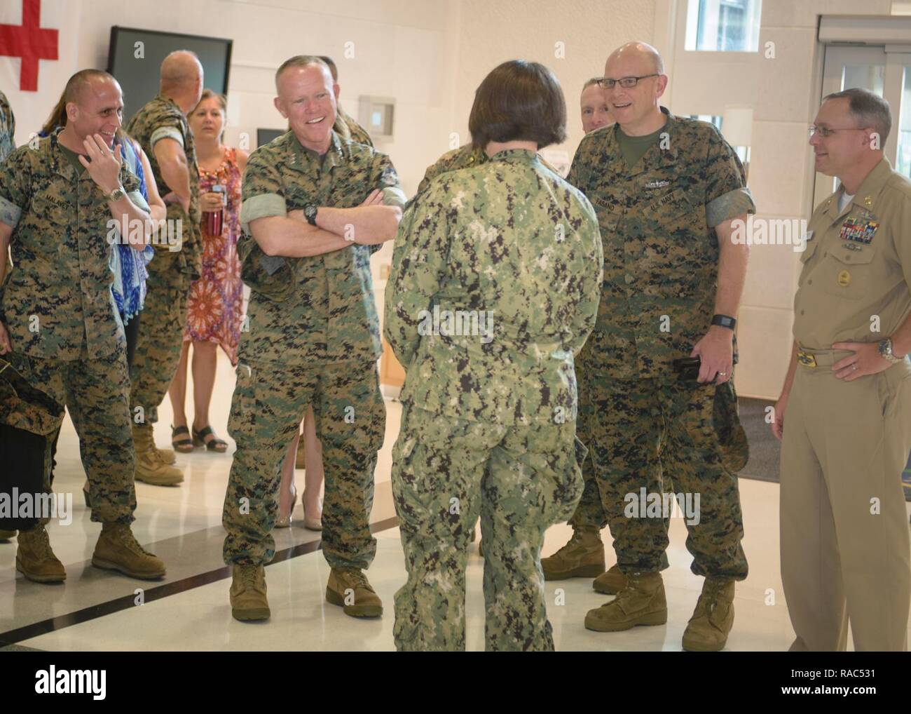 U.S. Navy Hospital Corpsman 2nd Class Stephanie Swogger (middle), a ...
