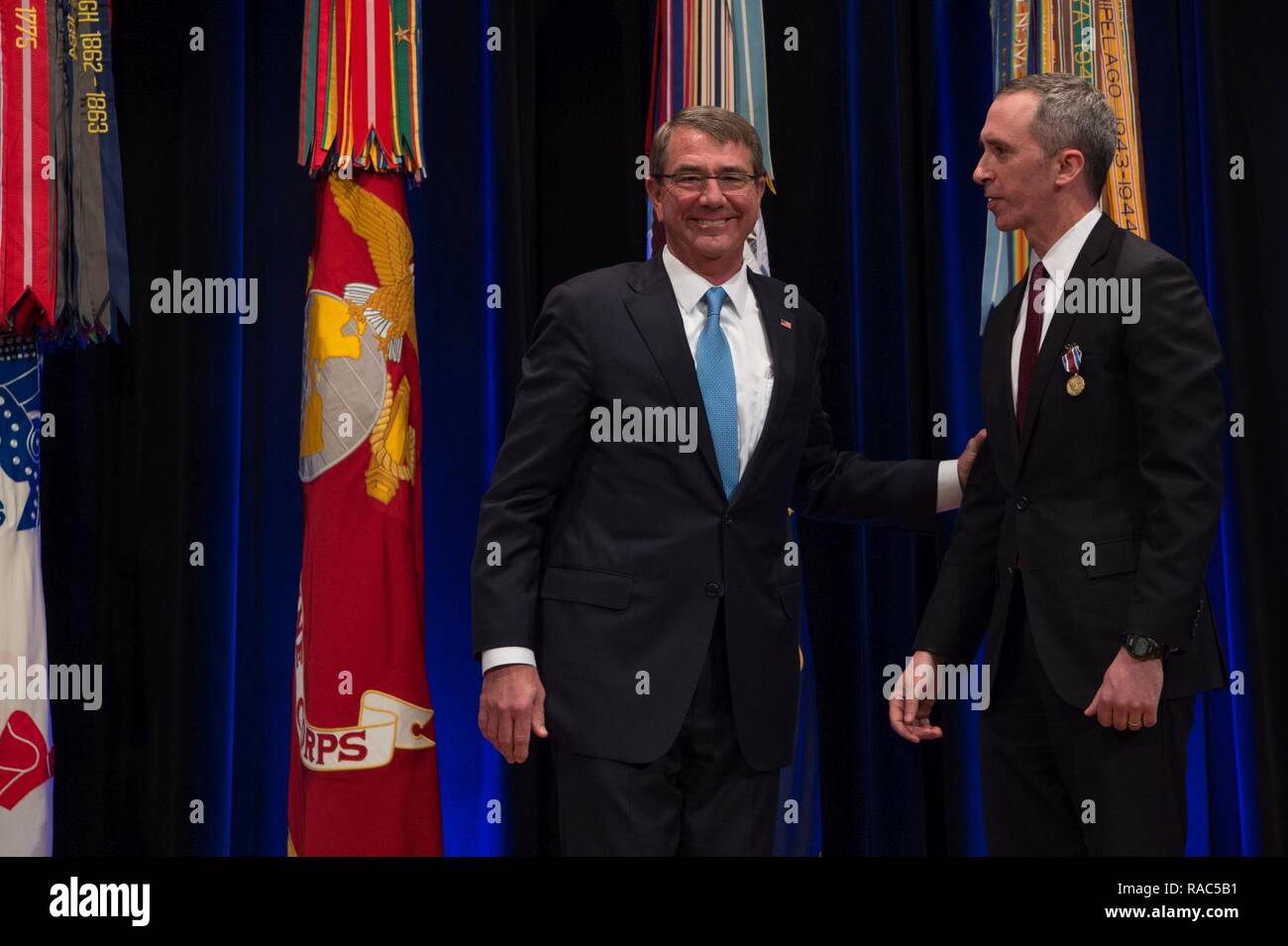 Defense Secretary Ash Carter recognizes the Under Secretary of Defense ...