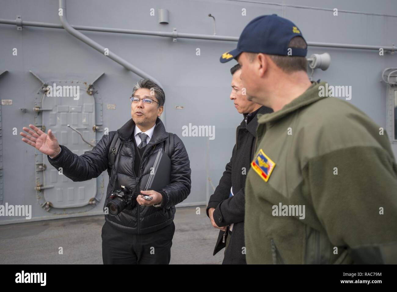 SASEBO, Japan (Jan. 18, 2017) Sunao Gushiken (left), journalist for ...