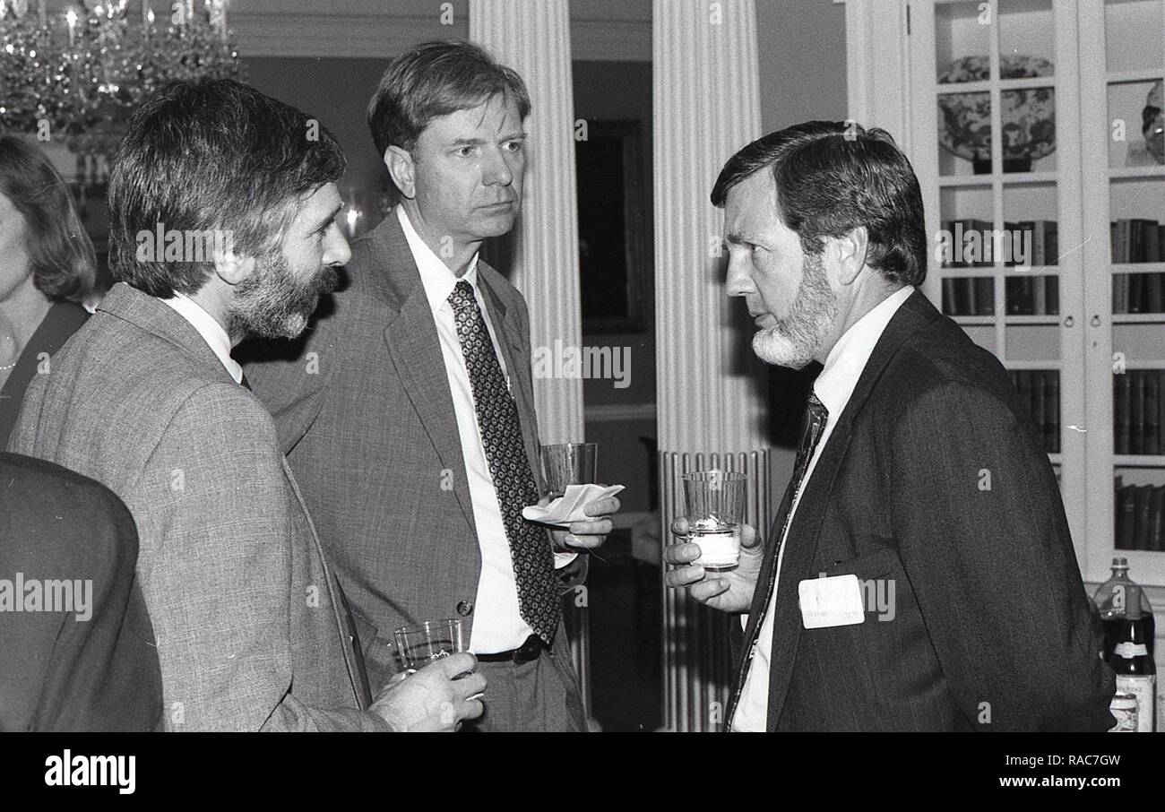 THREE MEN STANDING TOGETHER TALKING Stock Photo - Alamy