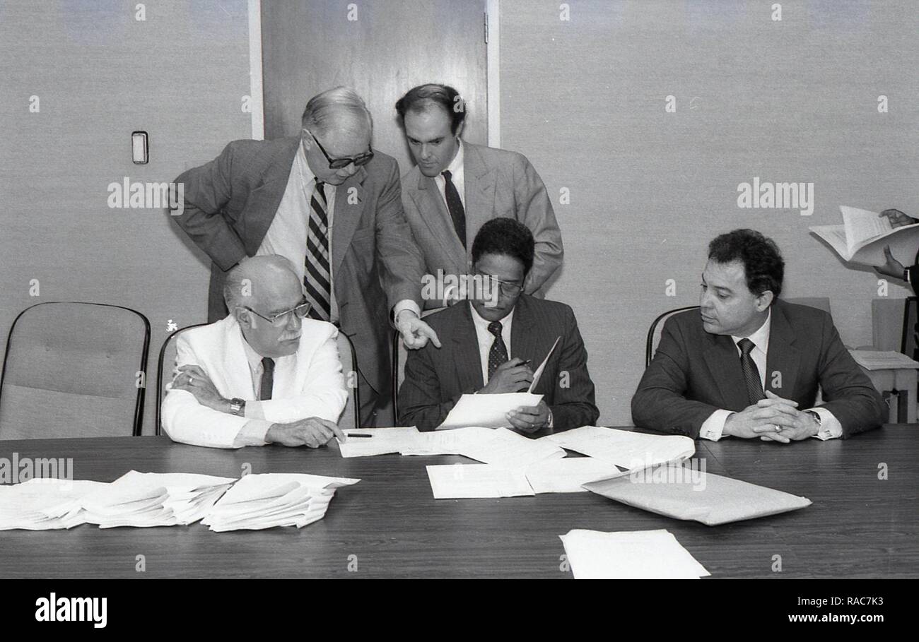 MEN AT TABLE HAVING A MEETING Stock Photo - Alamy