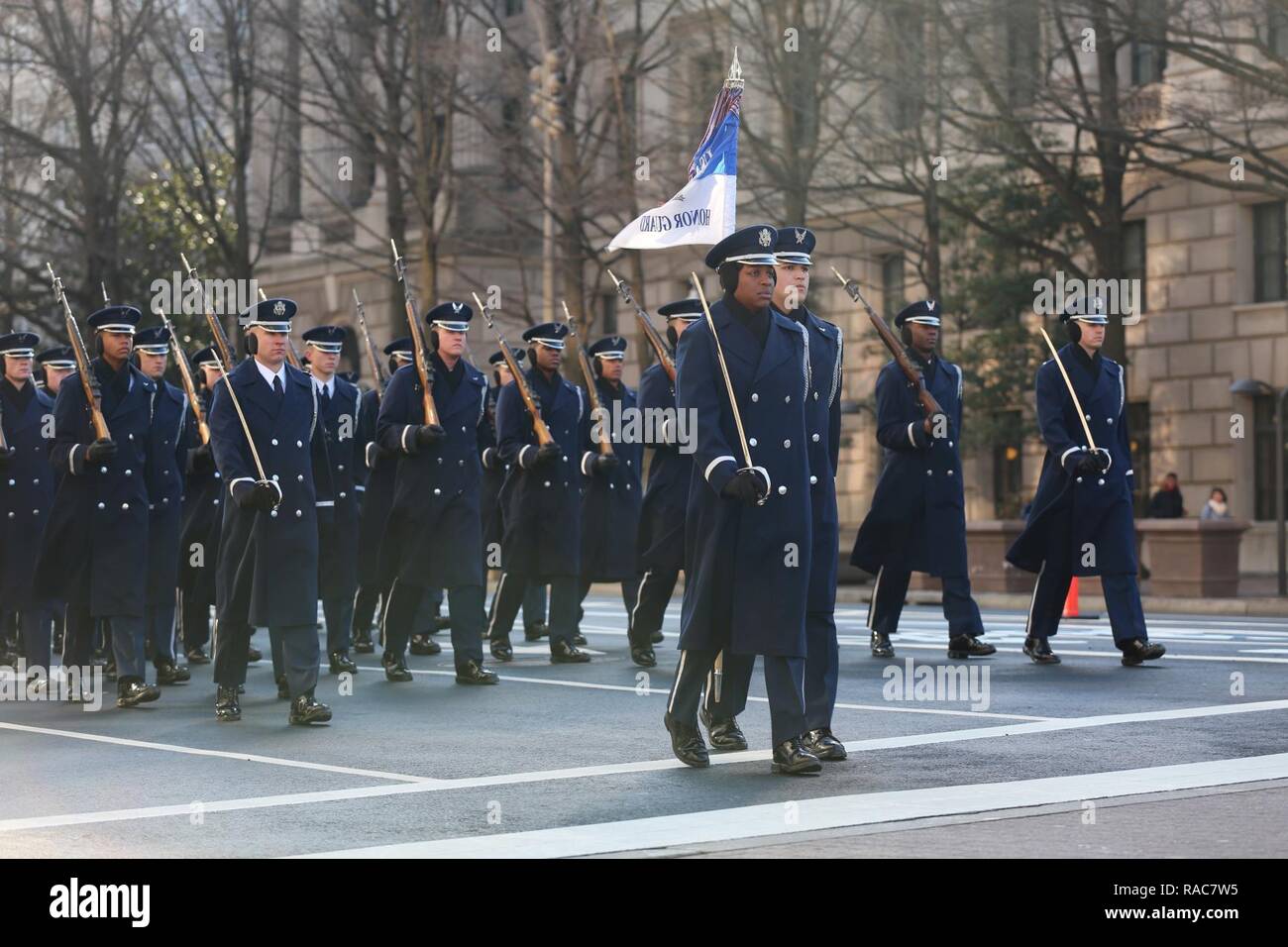 Members of the U.S. Air Force Color Guard march by Freedom Plaza along ...