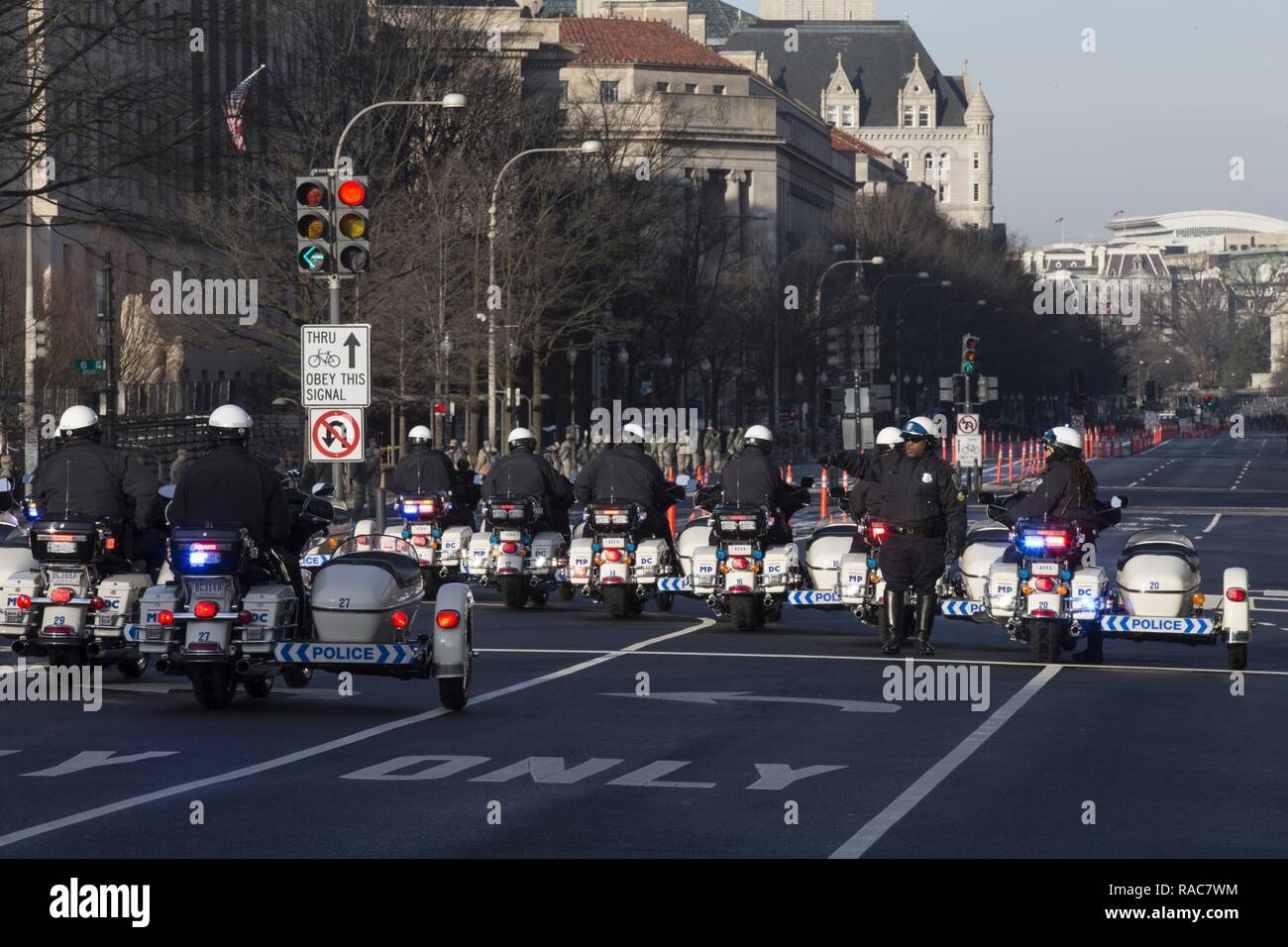 Metro D.C. Police motorcycles form a motorcade along Pennsylvania Ave ...