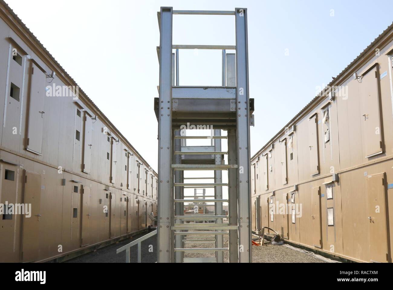 When completed this two- story steel- frame modular unit has the ...