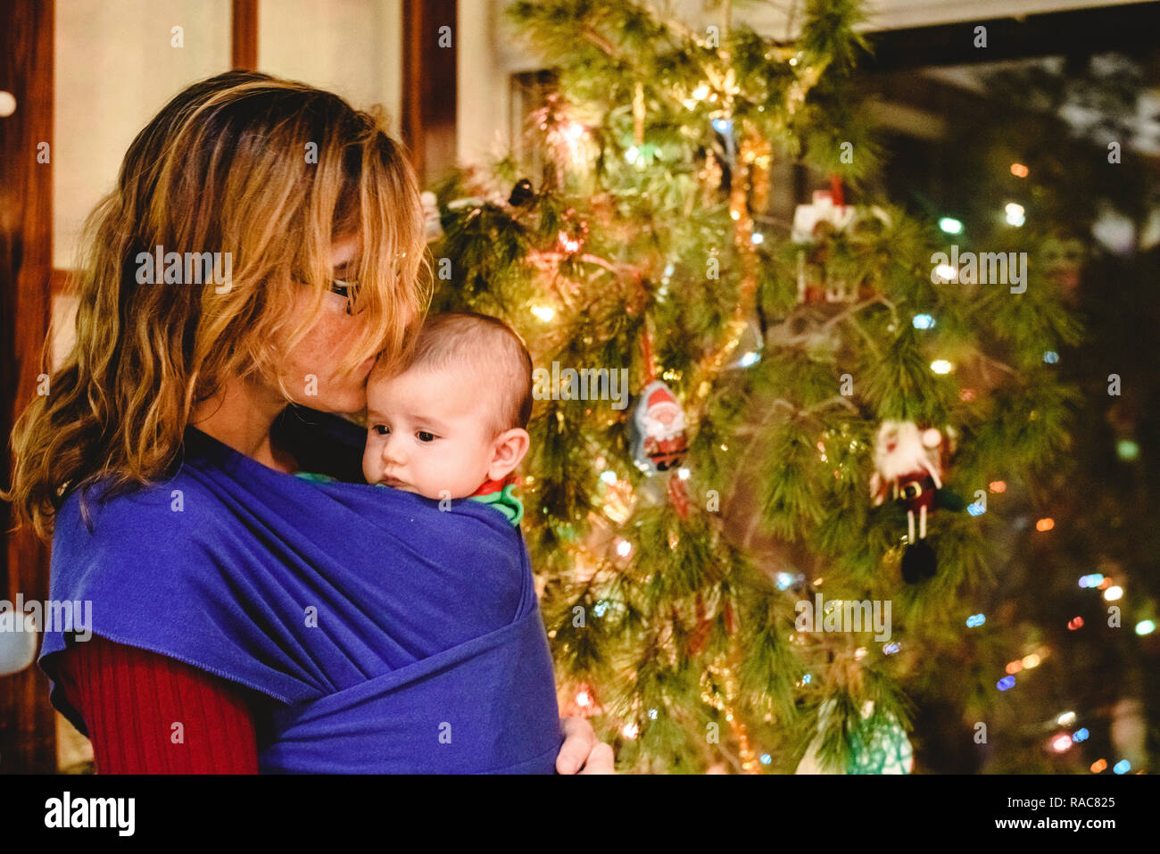 Mother newborn sling hi-res stock photography and images - Alamy