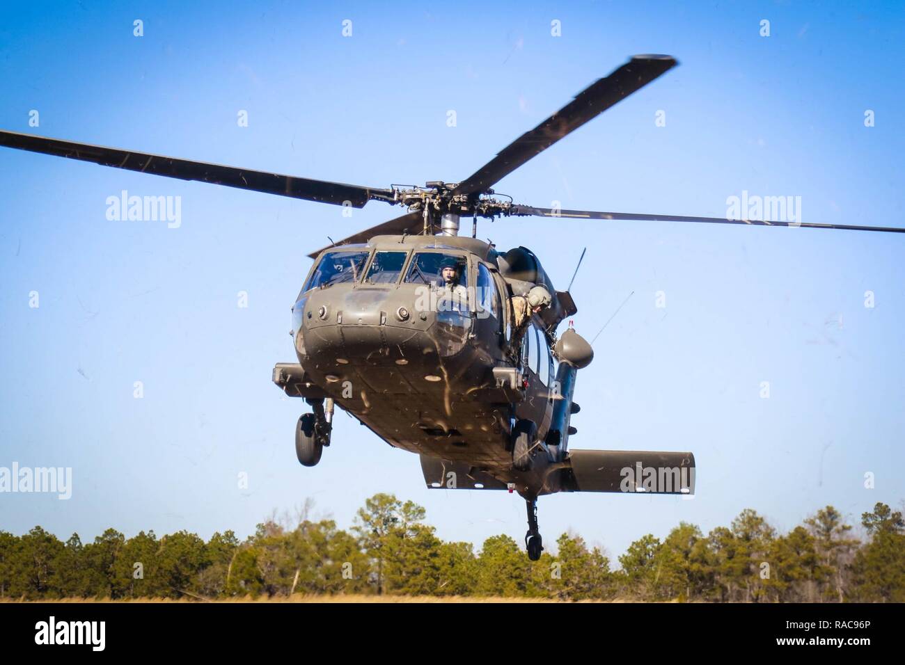 A UH-60 Black Hawk helicopter assigned to 82nd Combat Aviation Brigade ...