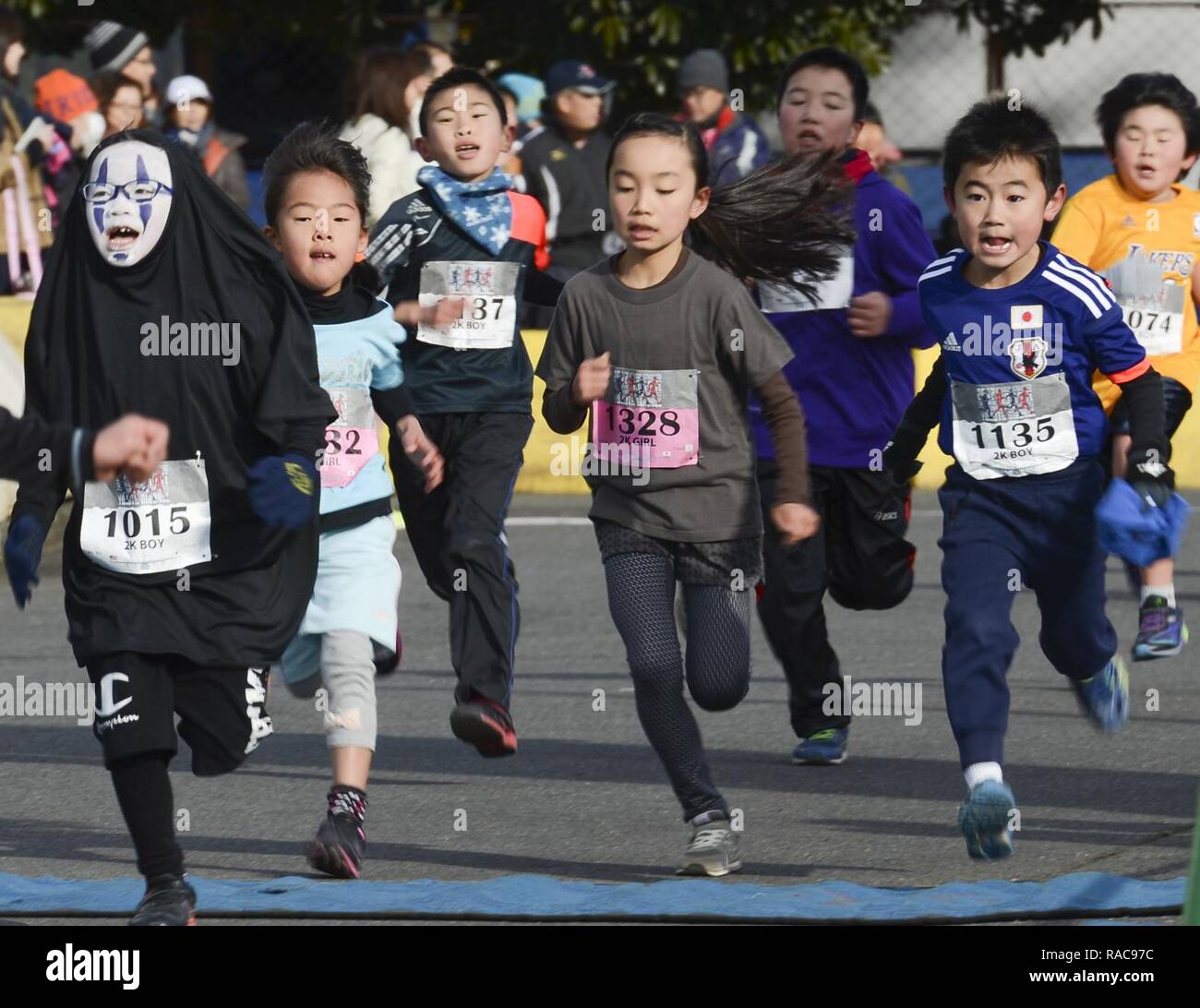 Children participate in the 2K Kid’s Race during the 36th Annual Yokota ...