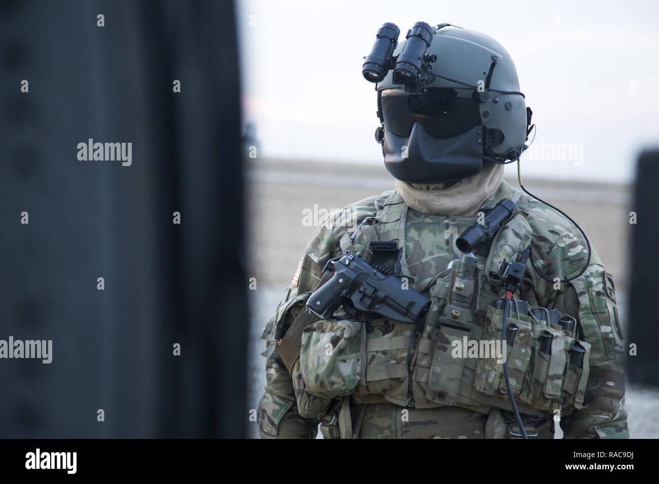 U.S. Army Sgt. Omid Jaafari, a UH-60 Black Hawk helicopter crew chief ...