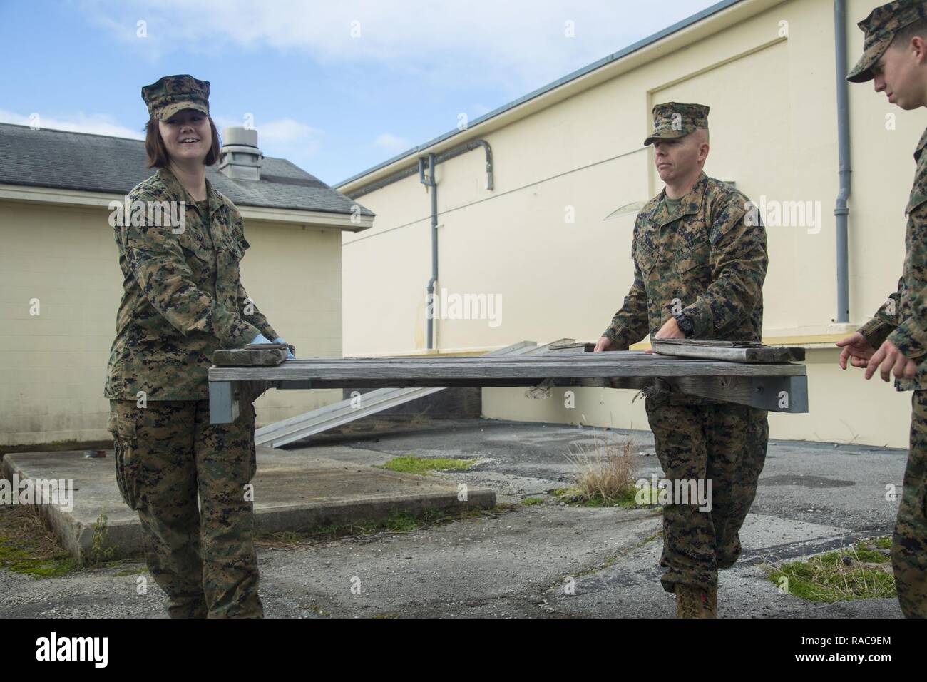 U.S. Marine Corps Sgt. Taylor Fodera (left), ground radio repairman ...