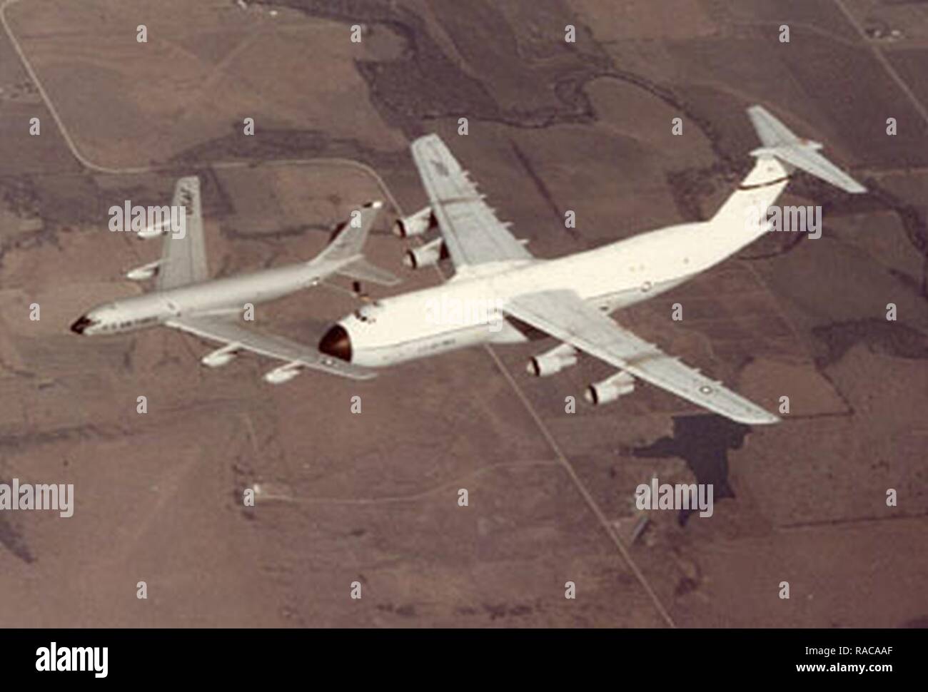 A KC-135 Stratotanker refuels a C-5 Galaxy, both stationed at Altus Air ...