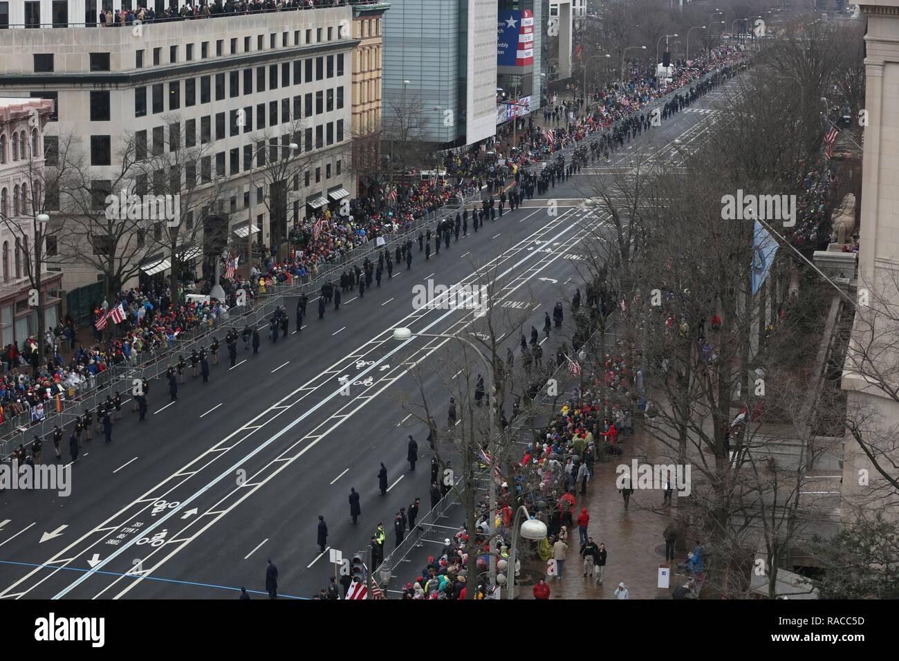 Members of the U.S. Air Force and law enforcement personnel cordon off ...