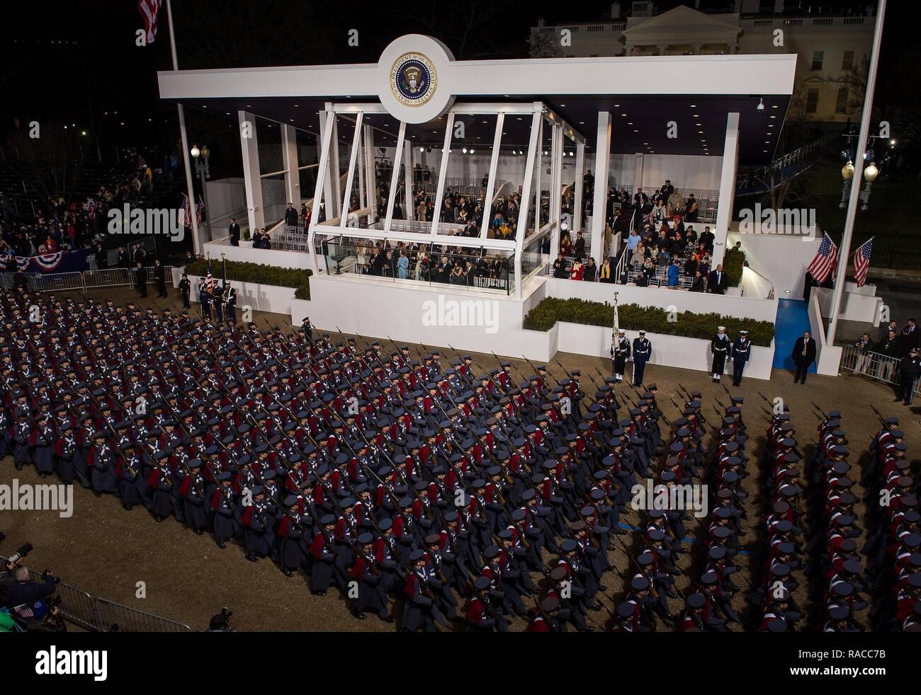 A sea of red and gray proceeds along Pennsylvania Avenue as the ...