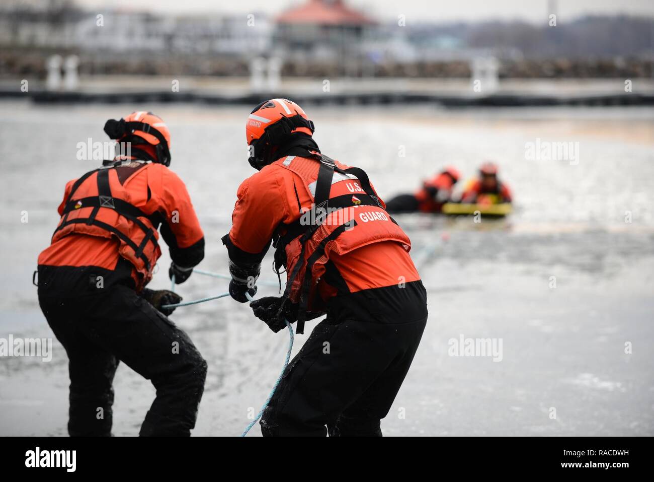 A Coast Guard Station Burlington ice rescue team trains using an ice ...