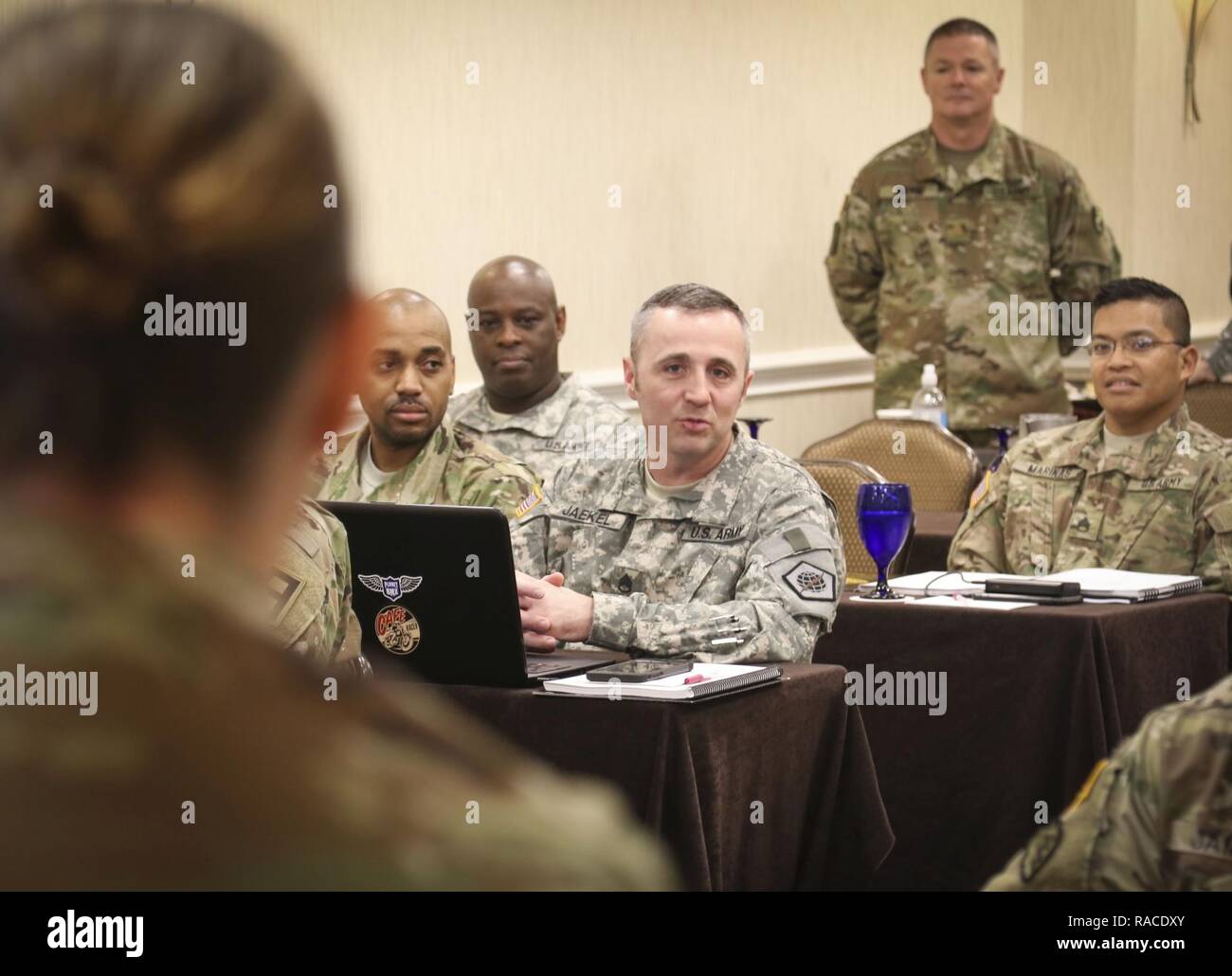 Army Reserve Staff Sgt. Timothy Jaekel (center), a platoon sergeant ...