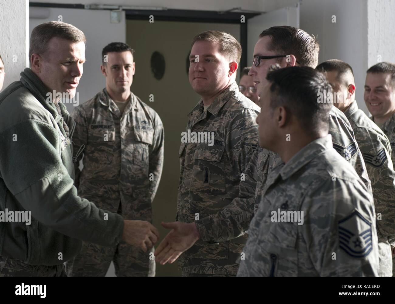 U.S. Air Force Airmen from the 702nd Munitions Support Squadron greet ...