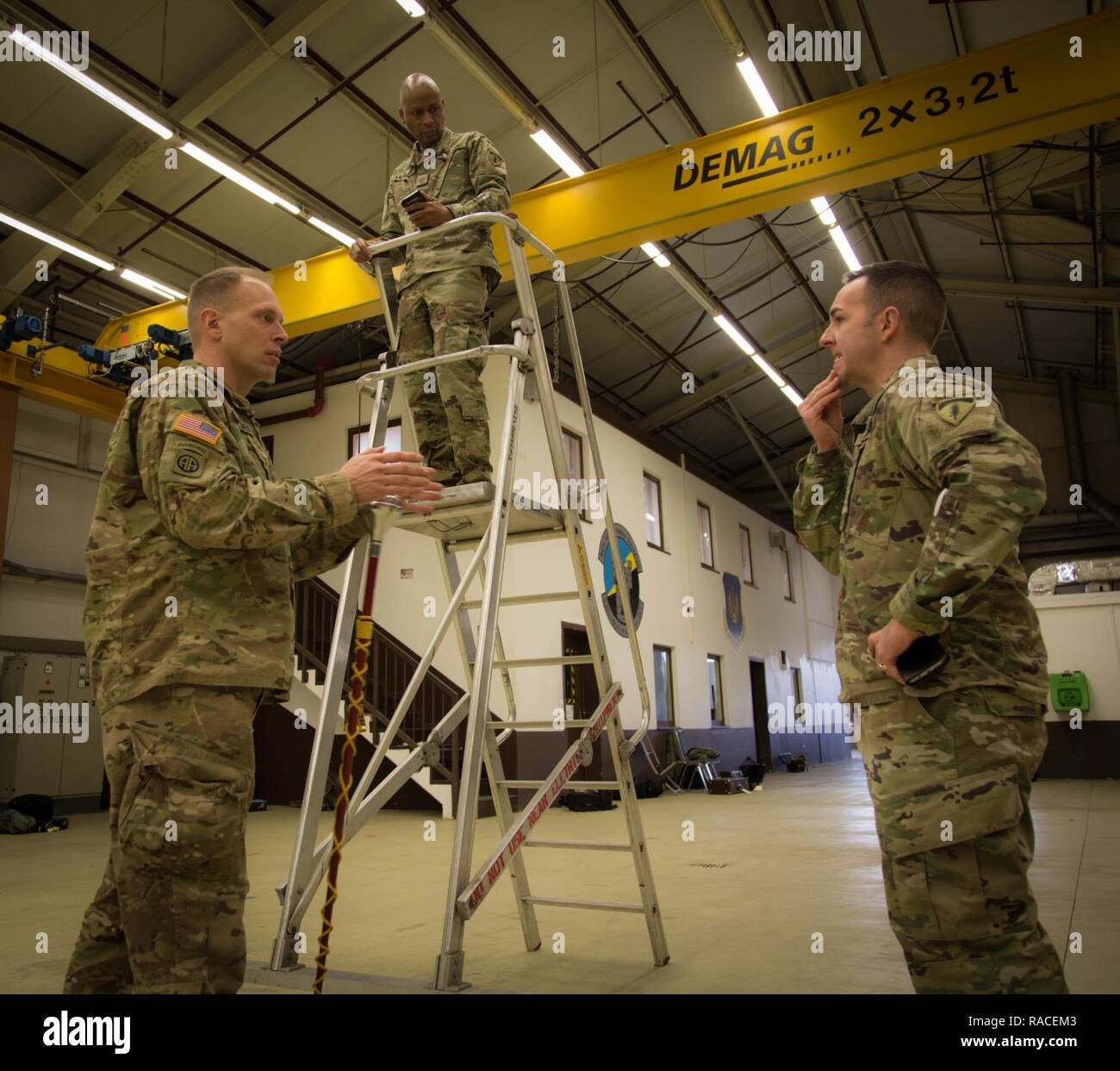 From left to right: Sgt. 1st Class Bill Holmes, Maj. Dwayne Milburn ...