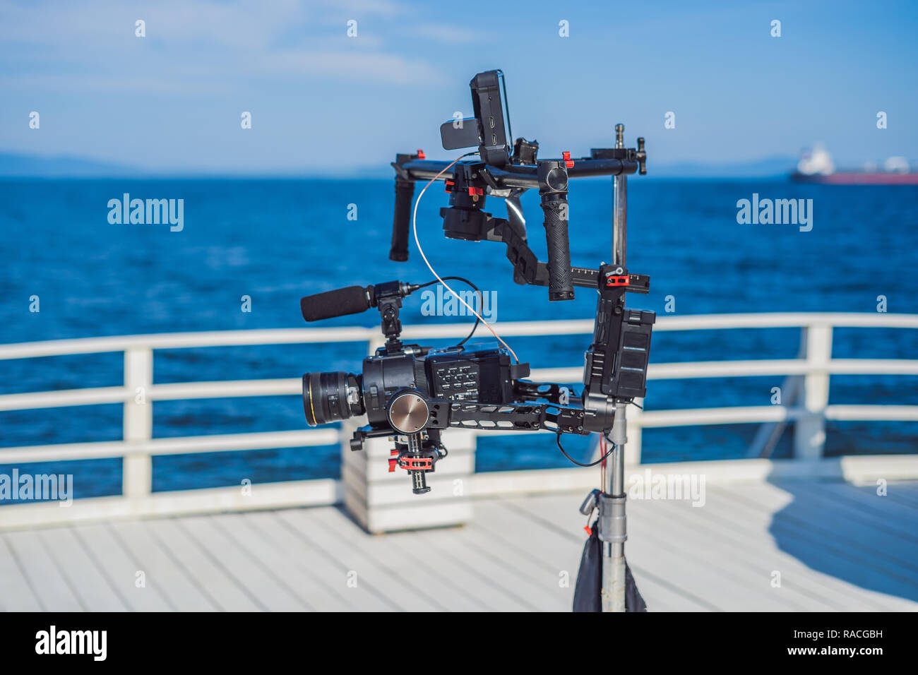 profeccional cinema camera on a 3-axis camera stabilizer system on a ...