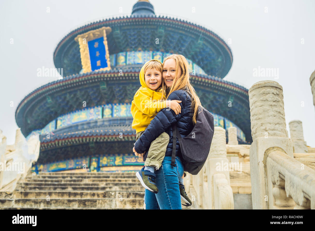 Mom and son travelers in the Temple of Heaven in Beijing. One of the ...