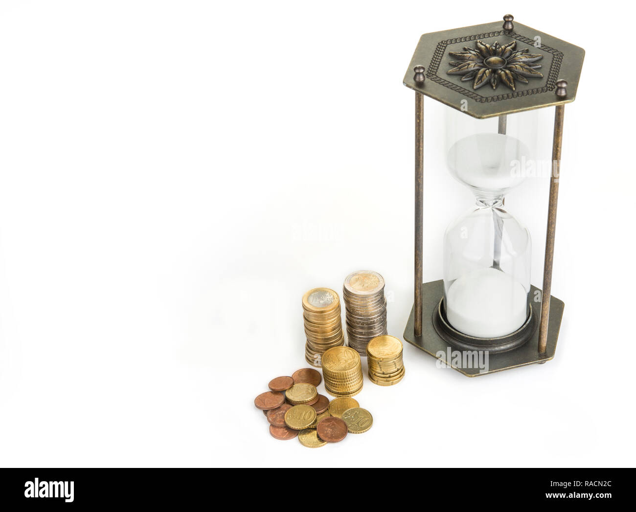 Hourglass clock with coins. Time is money concept Stock Photo - Alamy