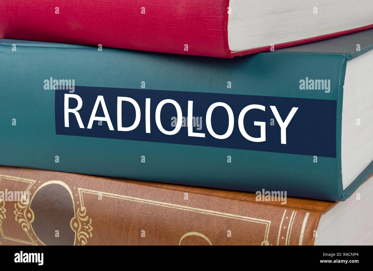 A book with the title Radiology written on the spine Stock Photo - Alamy