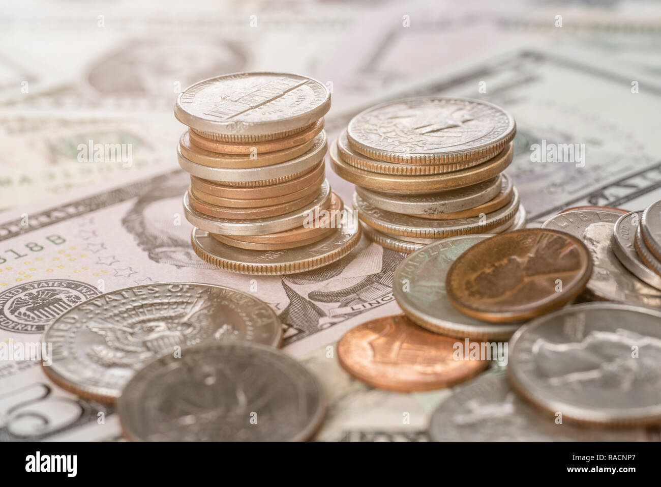Stacks coins dollar bills hi-res stock photography and images - Alamy