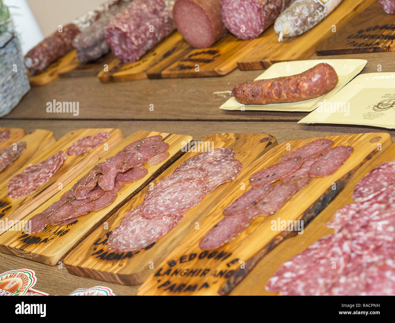 Various Types of Italian Sliced Salami on Wooden Chopping Boards Stock ...