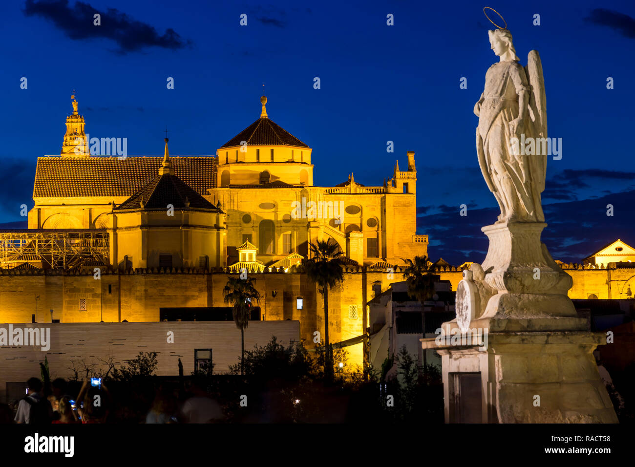 Statue on the Roman Bridge and the Mosque-Cathedral (Great Mosque of ...