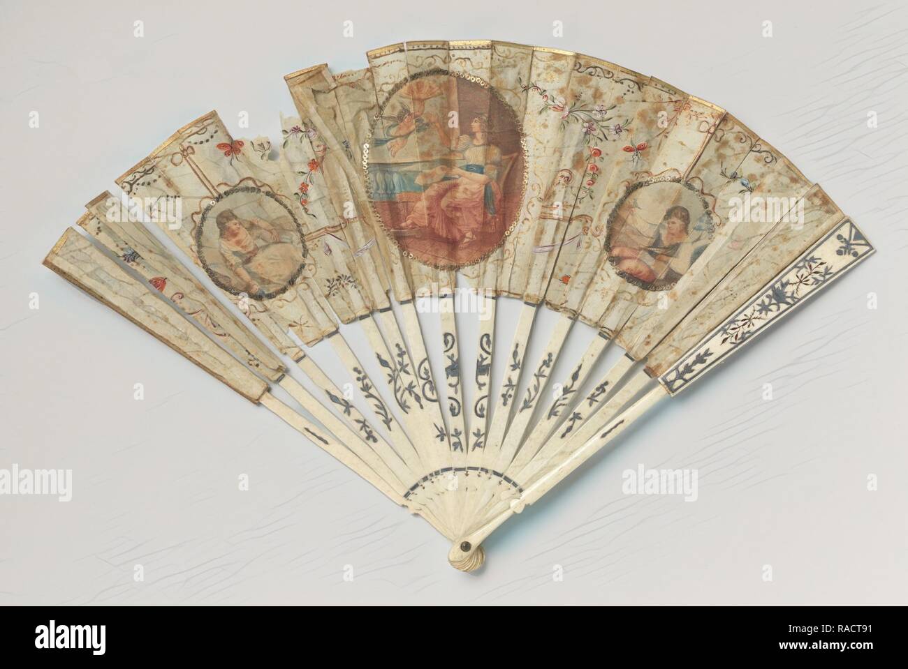 Folding fan with blade side to a medallion seated lady with fan and ...