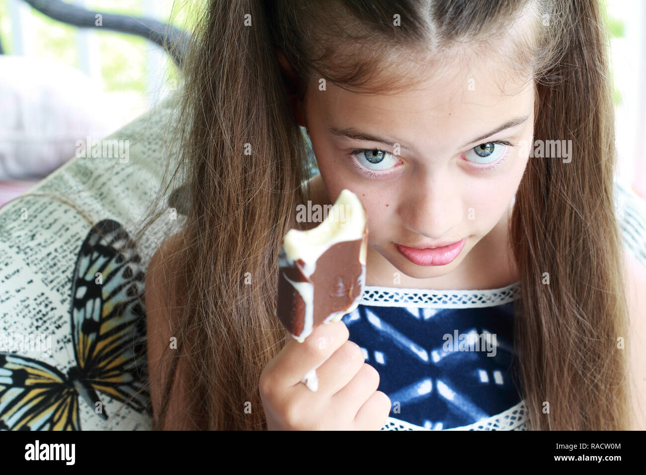 Girl eating messy ice cream hi-res stock photography and images - Alamy