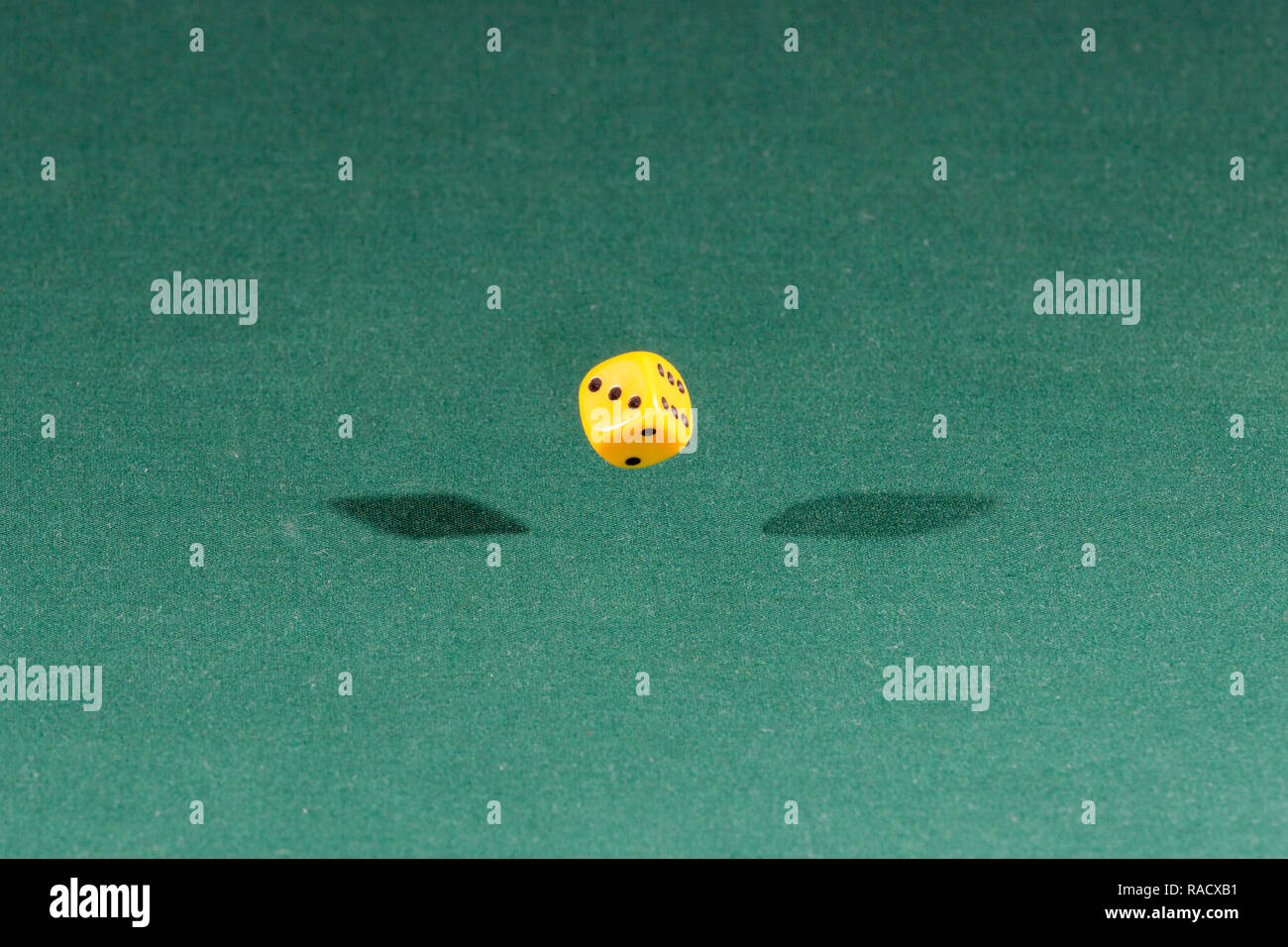 Yellow dice hi-res stock photography and images - Alamy