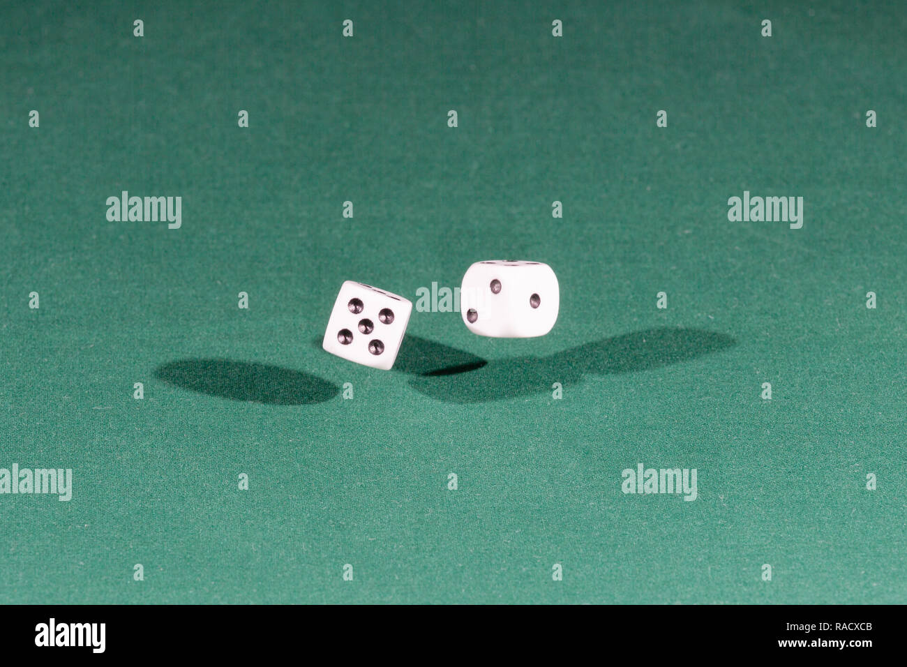 Two dice falling isolated on hi-res stock photography and images - Alamy