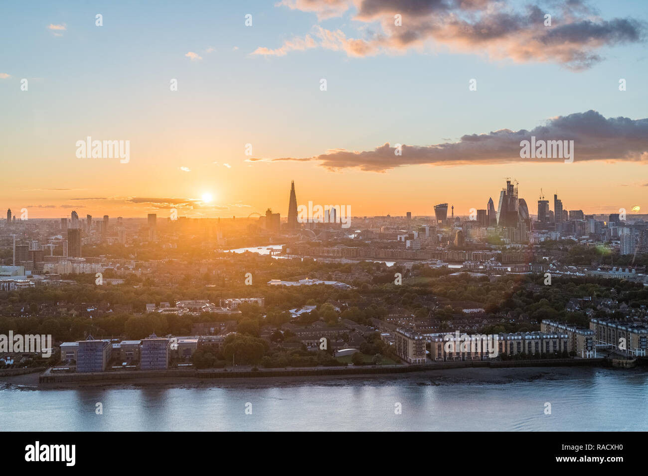 The sun sets over the City of London, London, England, United Kingdom ...