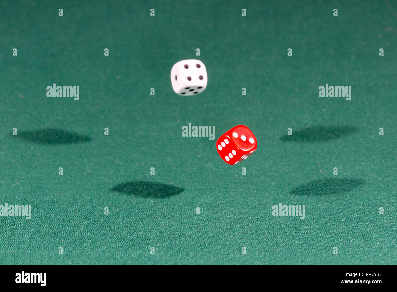 Red dice falling bouncing hi-res stock photography and images - Alamy