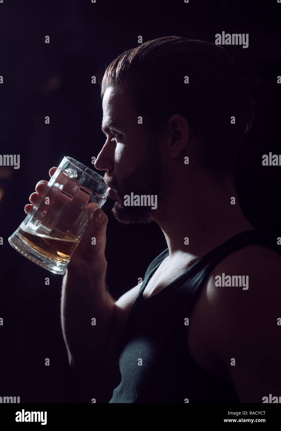 The best beer after a long day at work. Beer restaurant. Man drinker in ...