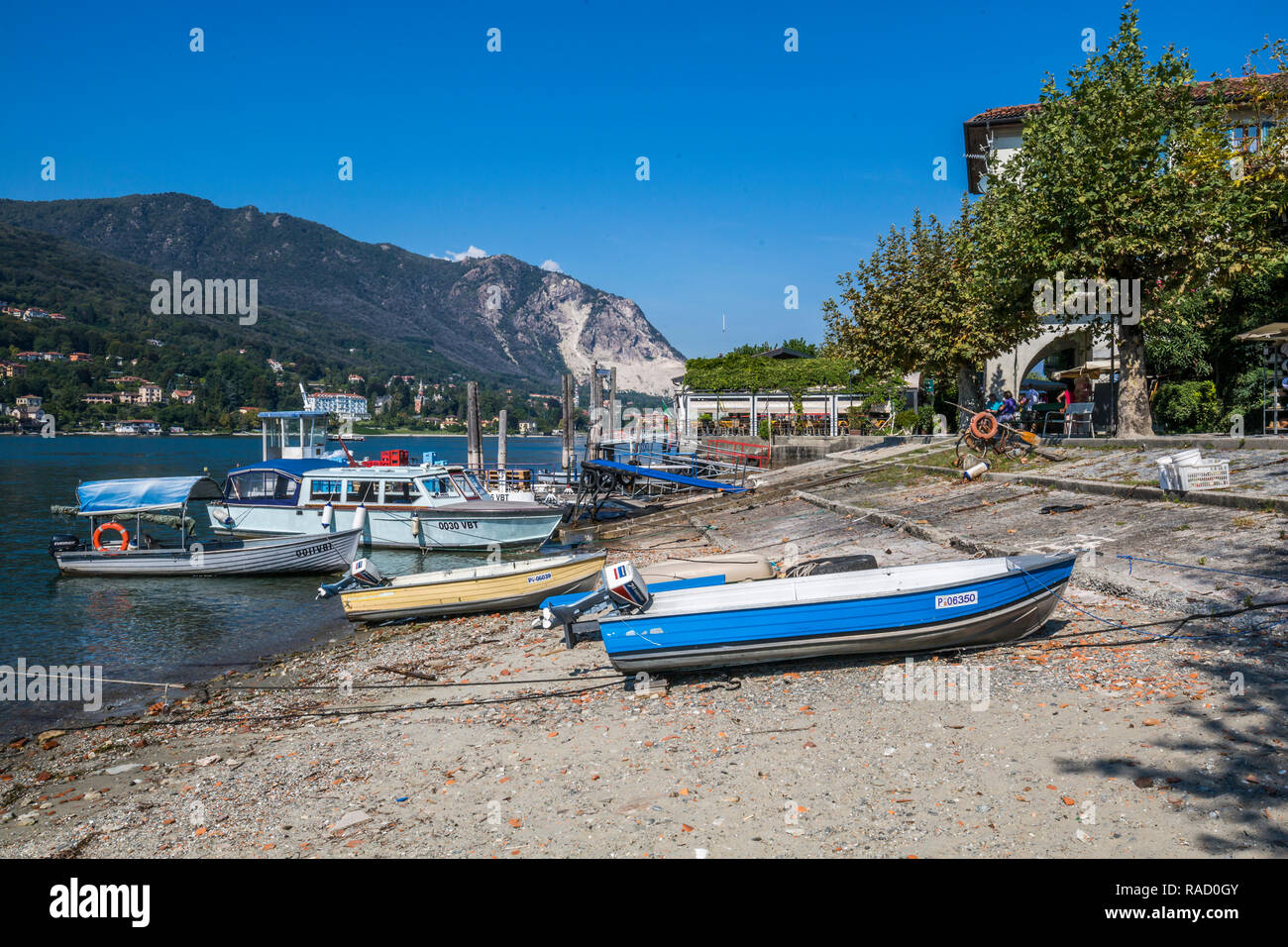Boats on beach of Isola dei Pescatori, Borromean Islands, Lake Maggiore ...