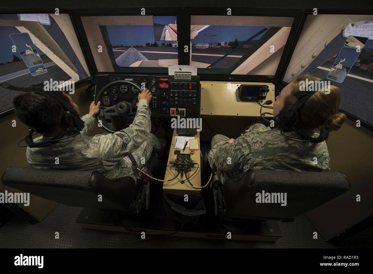 U.S. Air Force Senior Airman Xavier Navarro and 1st Lt. Ashley Wright ...