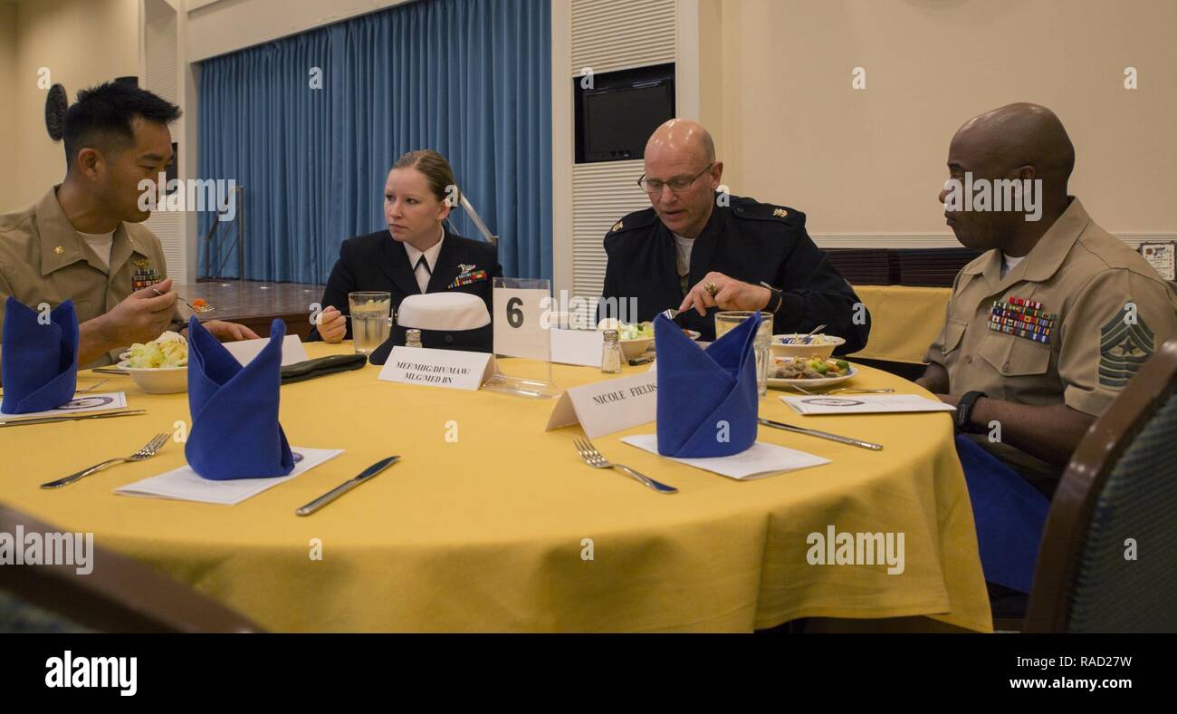 U.S. Navy Petty Officer 2nd Class Sara Ducksworth (second from the left ...