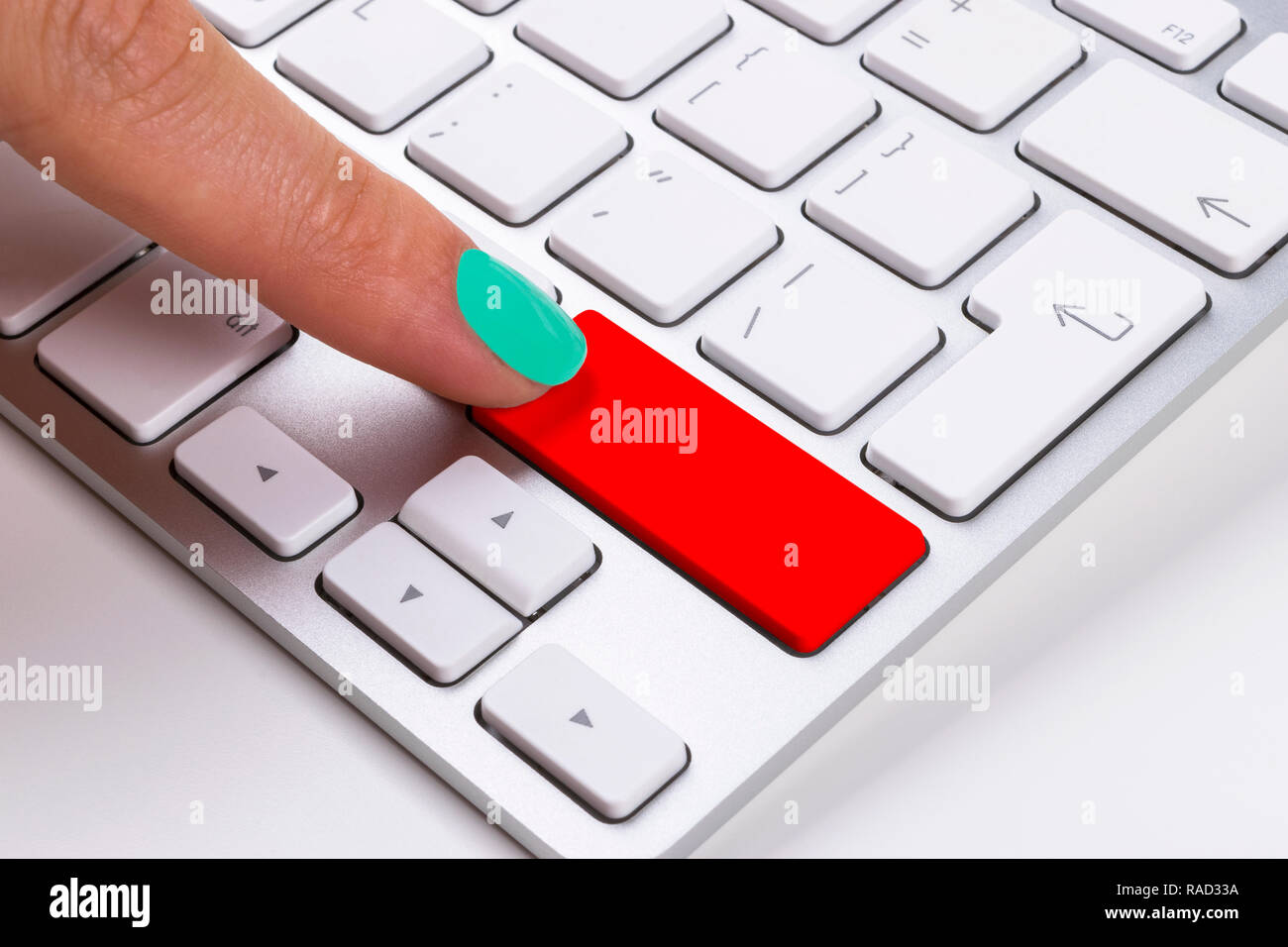 Close up view of a Finger Pushing on a red Button of computer Keyboard ... Close up view of a Finger Pushing on a red Button of computer Keyboard ...