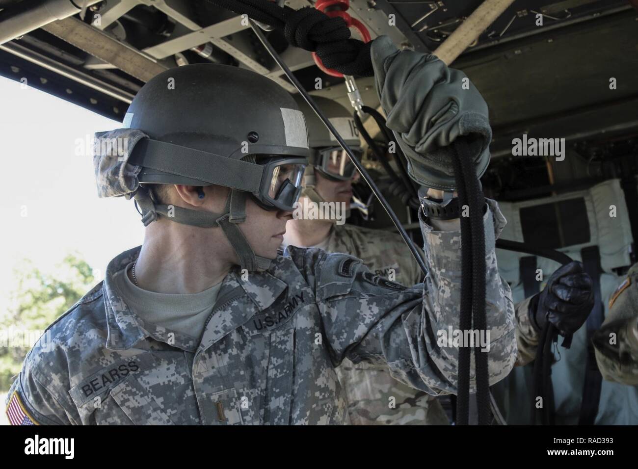 XVIII Airborne Corps DeGlopper Air Assault School students listen to ...
