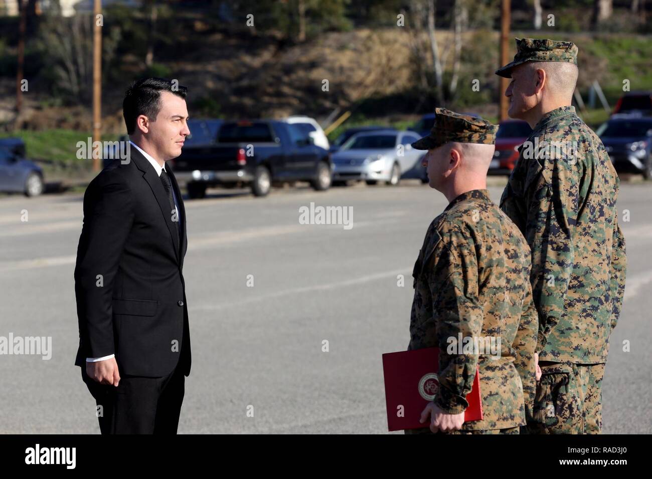 Sgt. Zachary L. Piepenhagen (left), stands at attention as Maj. Gen ...