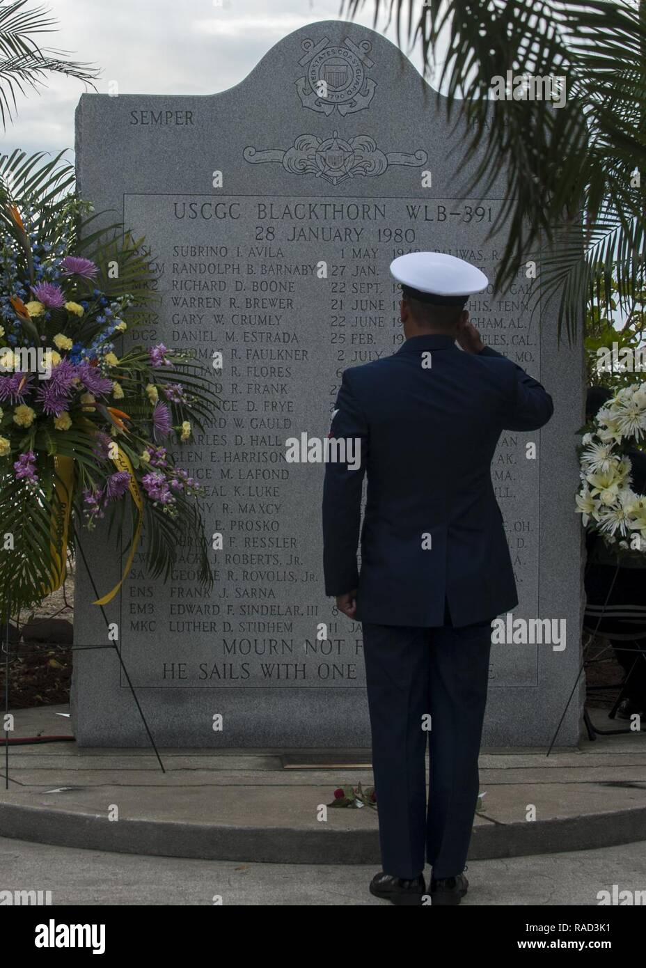 A crew member from the Coast Guard Cutter Bernard C. Webber, a 154-foot ...