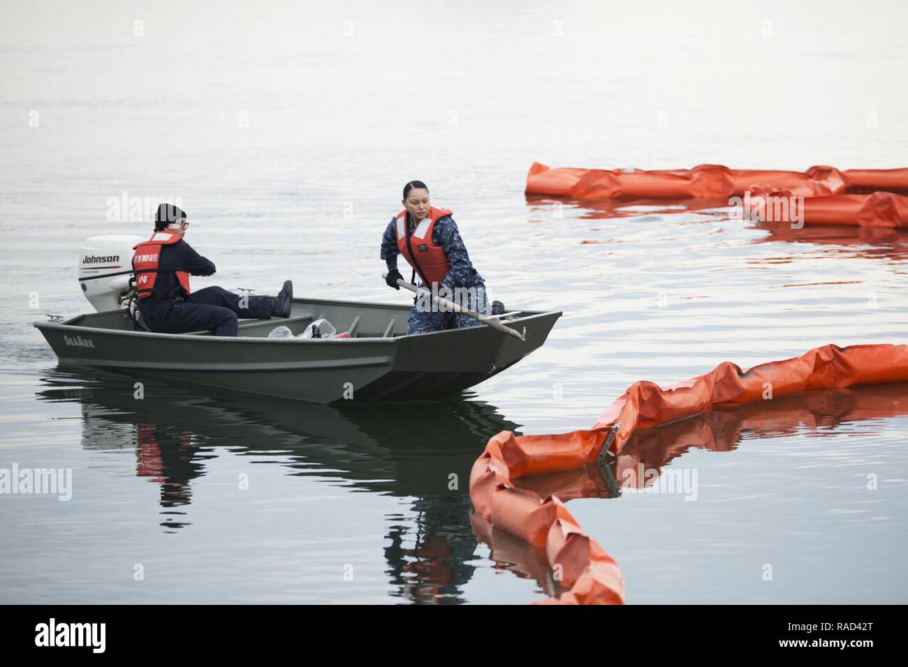 U.S. Navy Engineman 3rd Class Elizabeth Rodriguez, left, and U.S. Navy ...