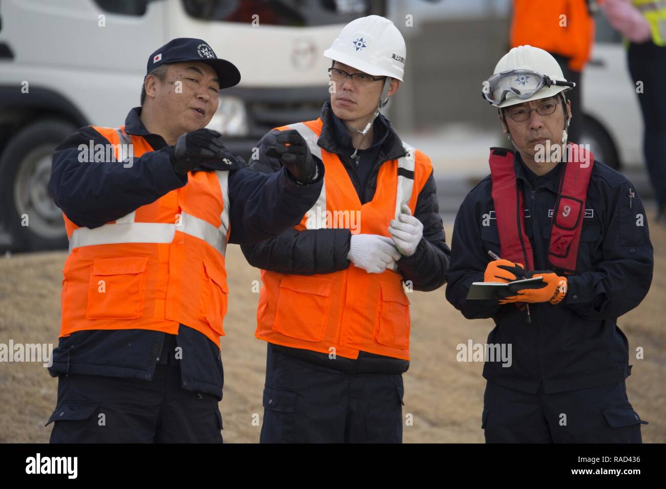 Maritime Disaster Prevention Center (MDPC) personnel discuss operations ...